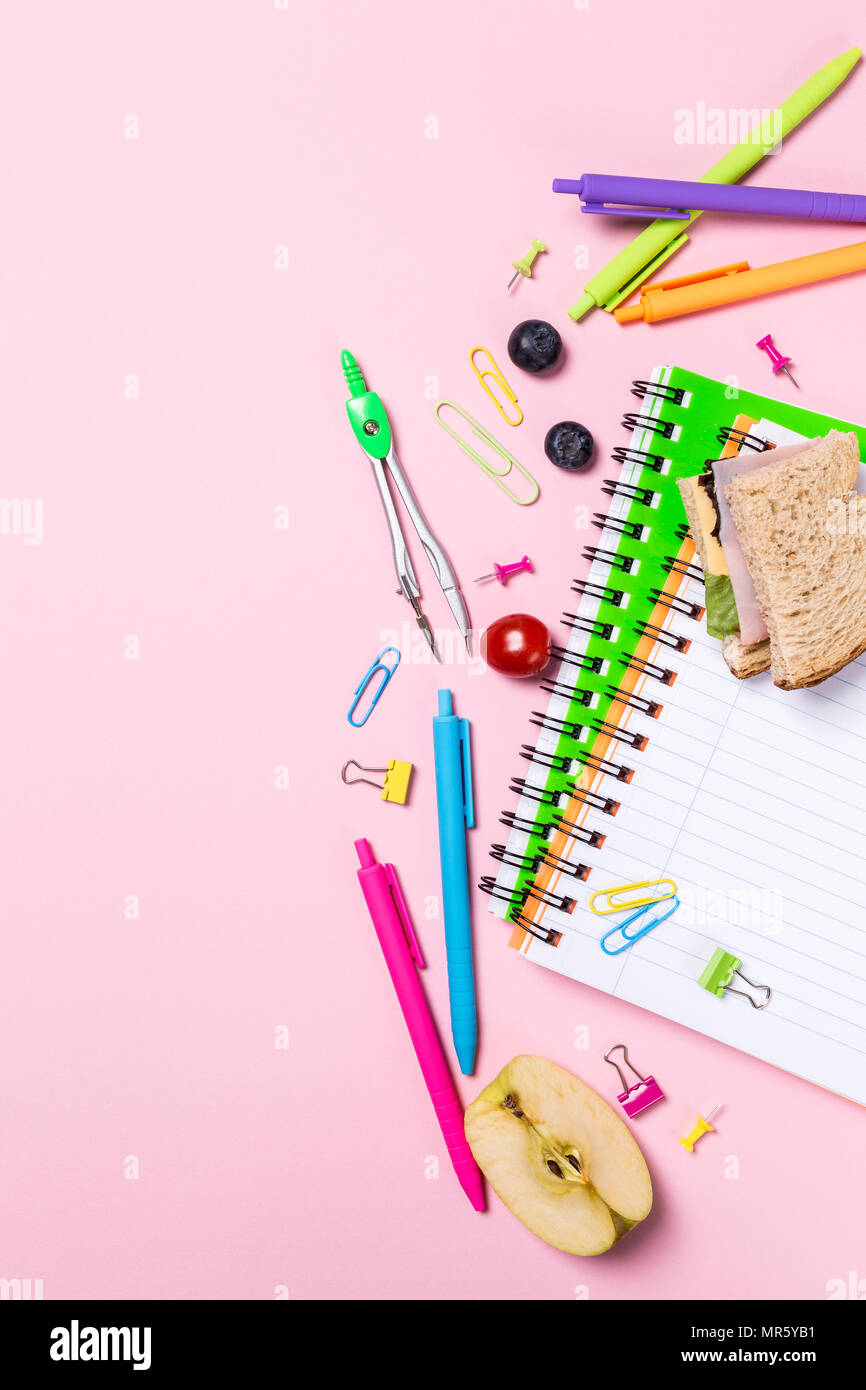School background with notebooks and colorful supplies Stock Photo - Alamy