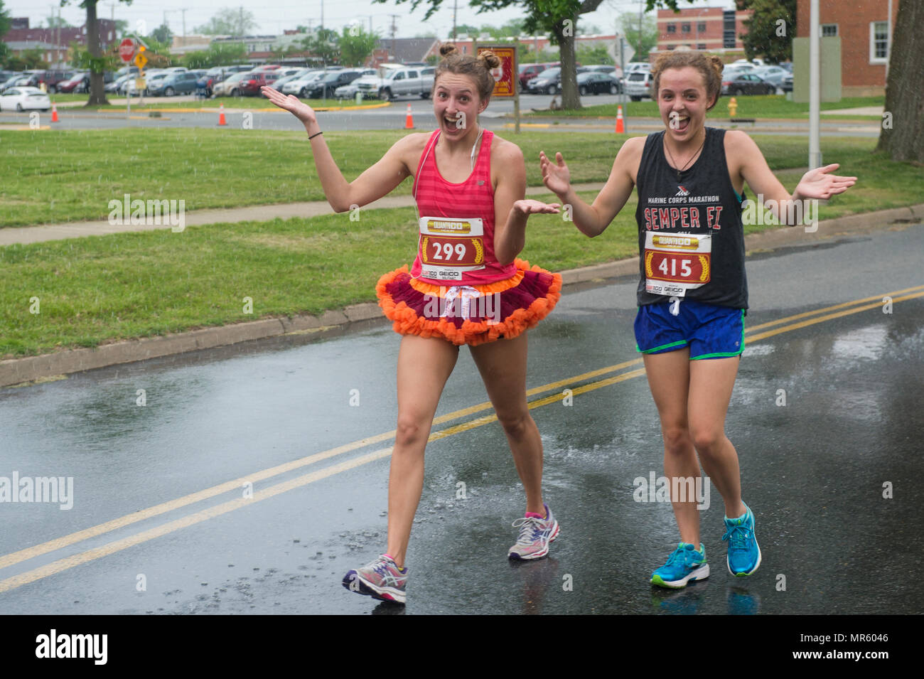 Madeline Murray, left, and Rebecca Murray participate in the Centennial ...