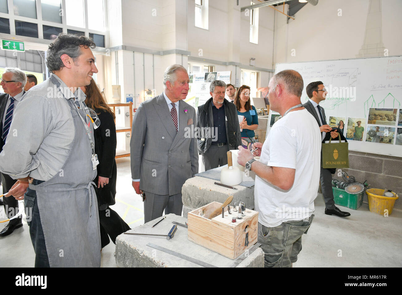 The Prince of Wales meets stone masons Peter Loizou (left) and Edward ...