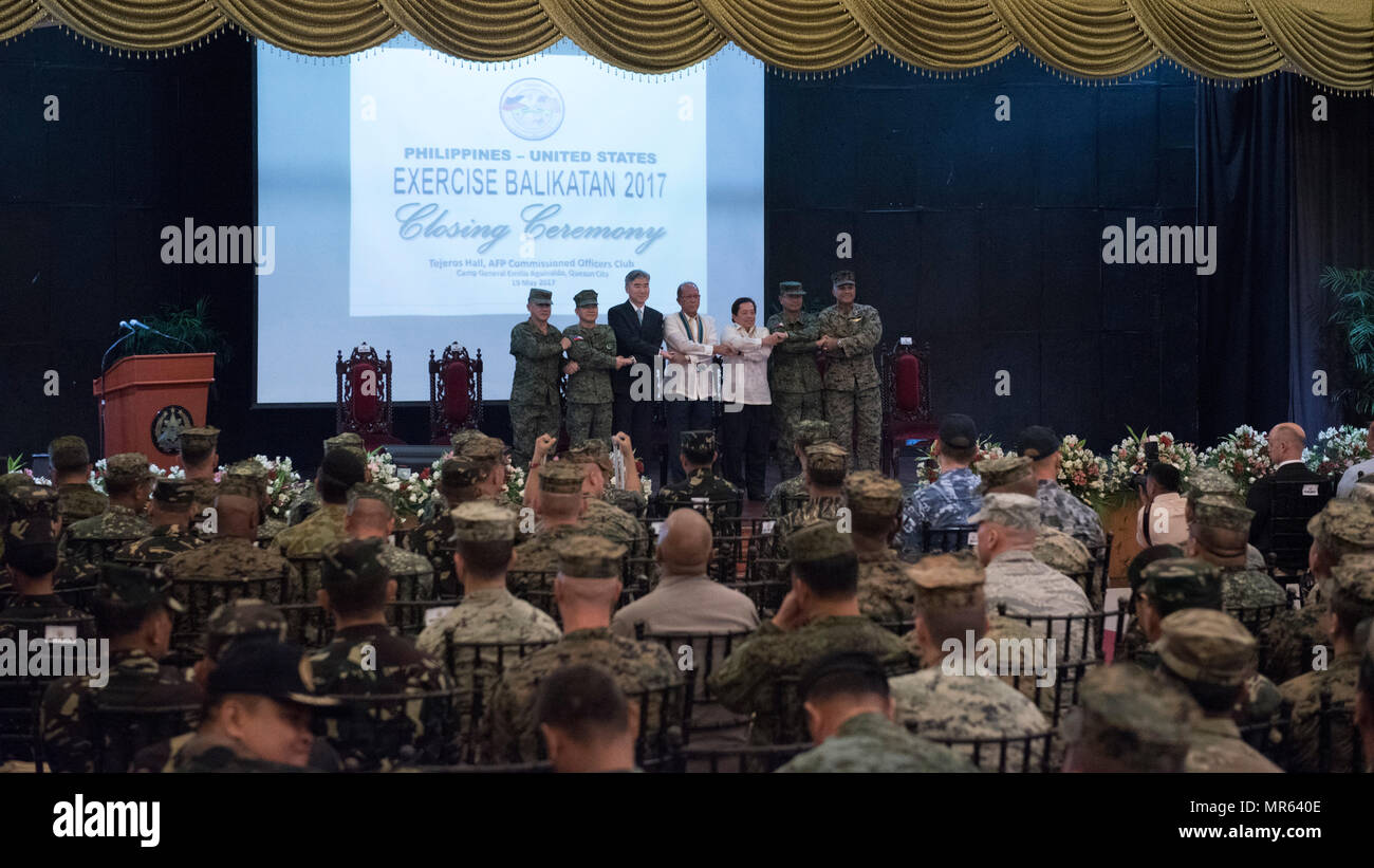 Armed Forces of the Philippines Maj. Gen. Herminigildo Aquino, left ...