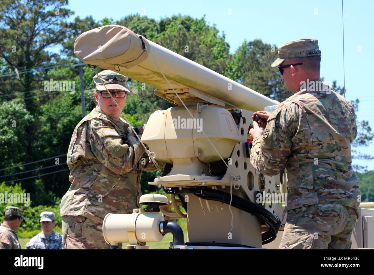 Sgt. Sasha Durnal and Spc. Ryan Mcelaney, both assigned to the 338th ...