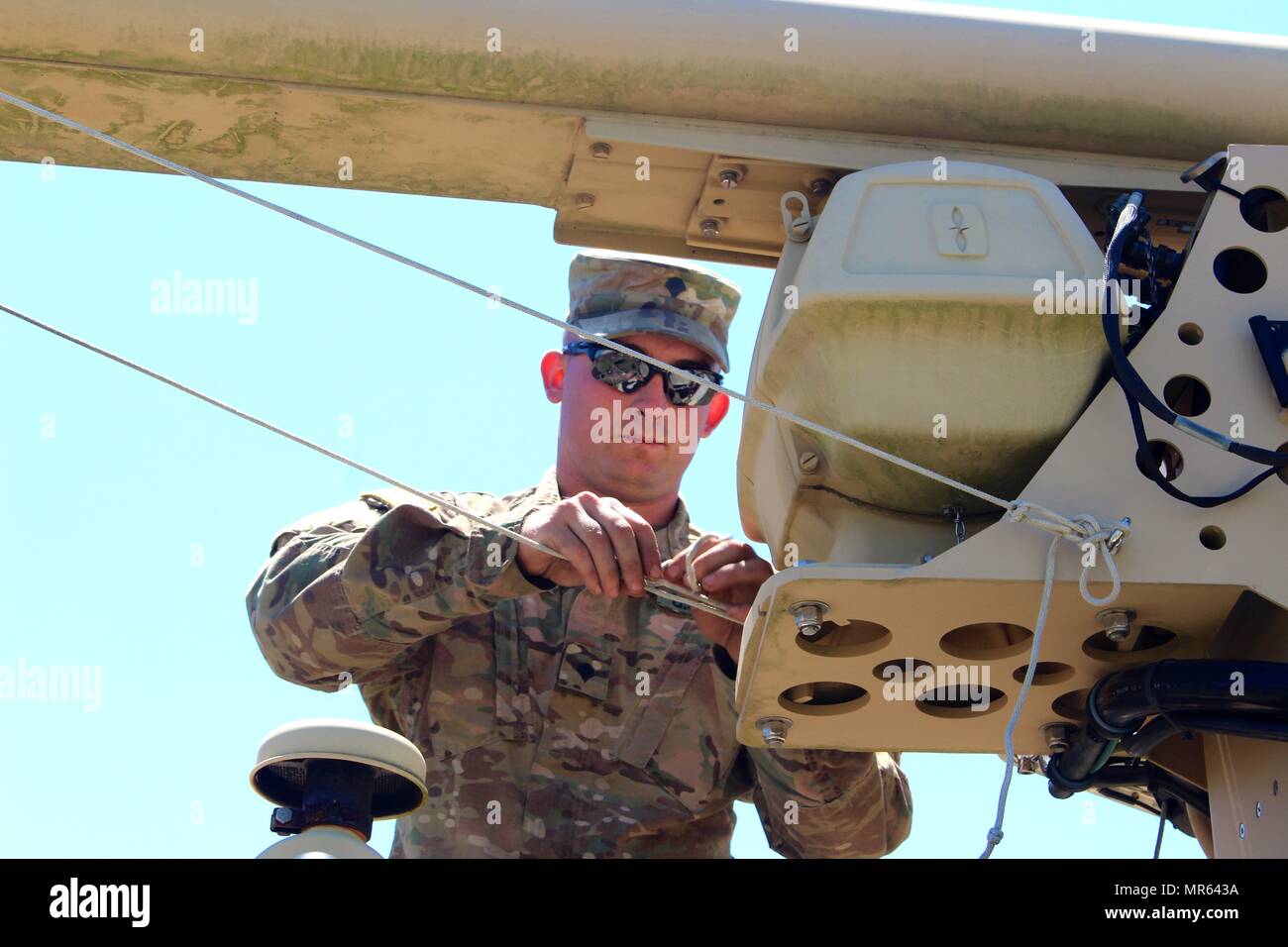 Spc. Ryan Mcelaney, assigned to the 338th Transportation Detachment ...