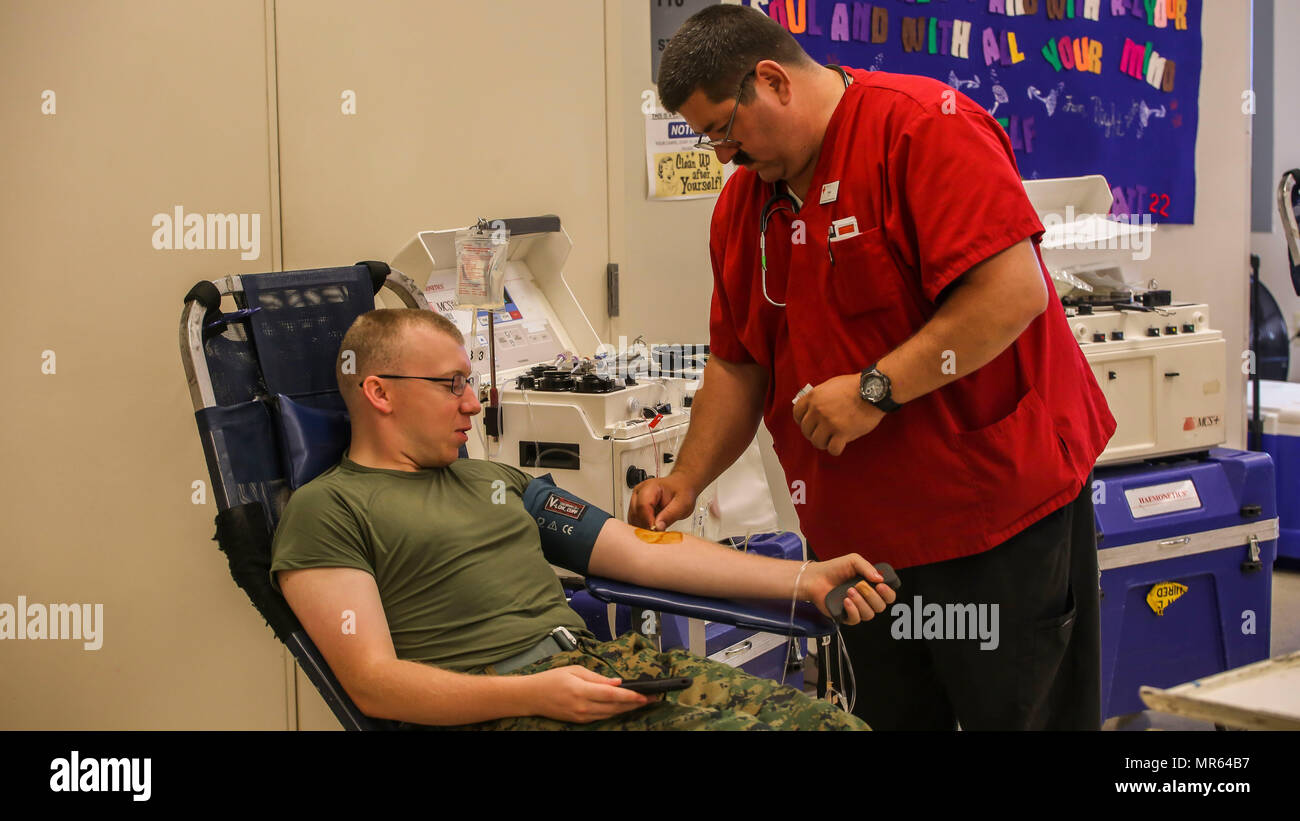 A Marine goes through a red cell donation at the station chapel for the ...