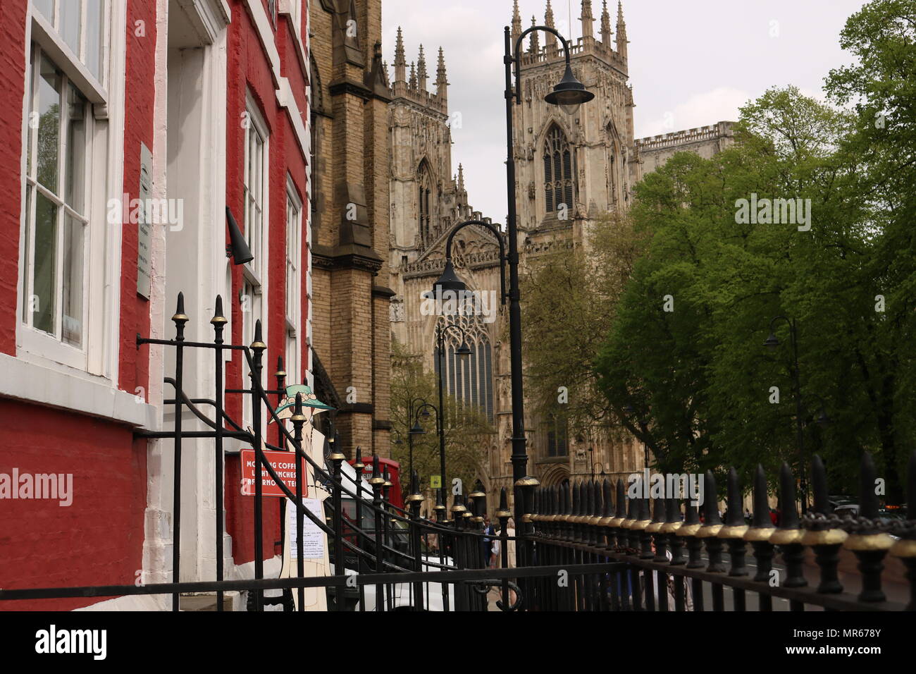 The famous York minster in the background with the the tudour house in ...
