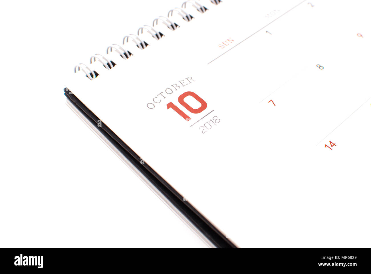 Desk calendar on white background Stock Photo - Alamy