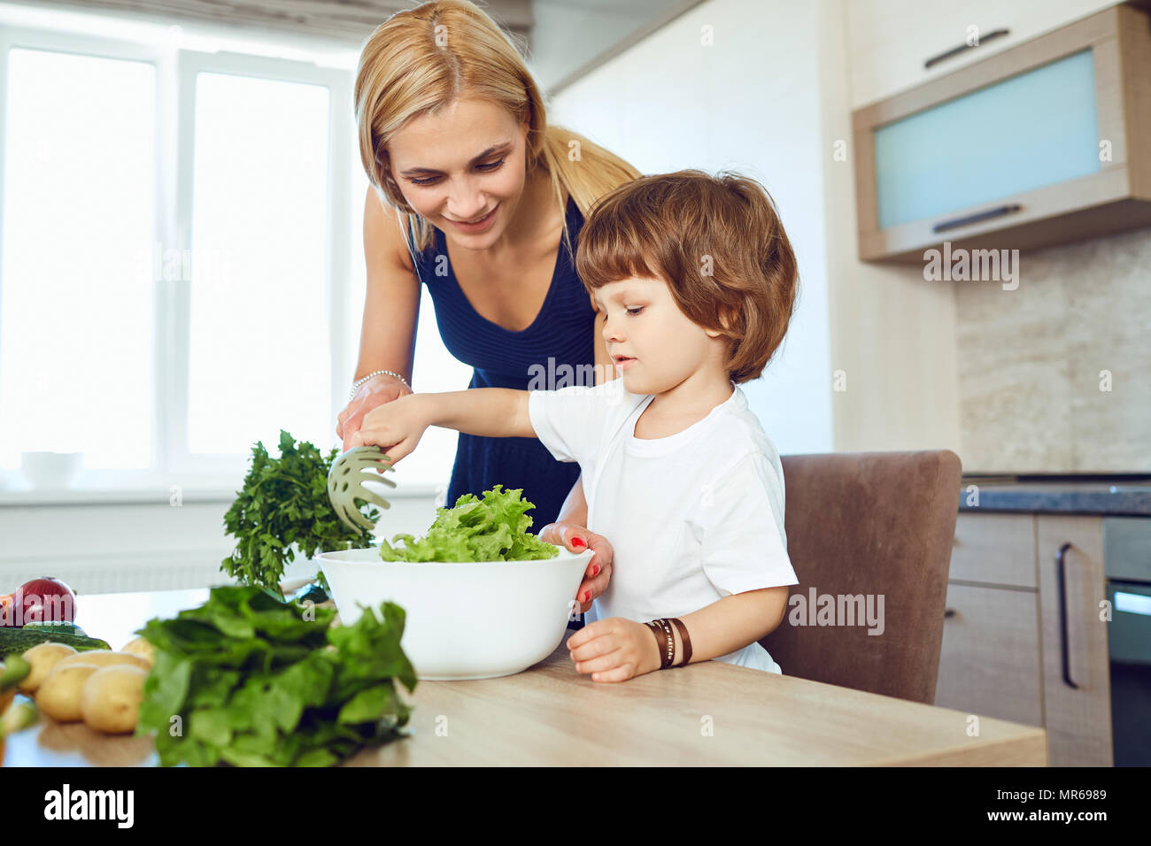 Child preparing healthy food hi-res stock photography and images - Alamy