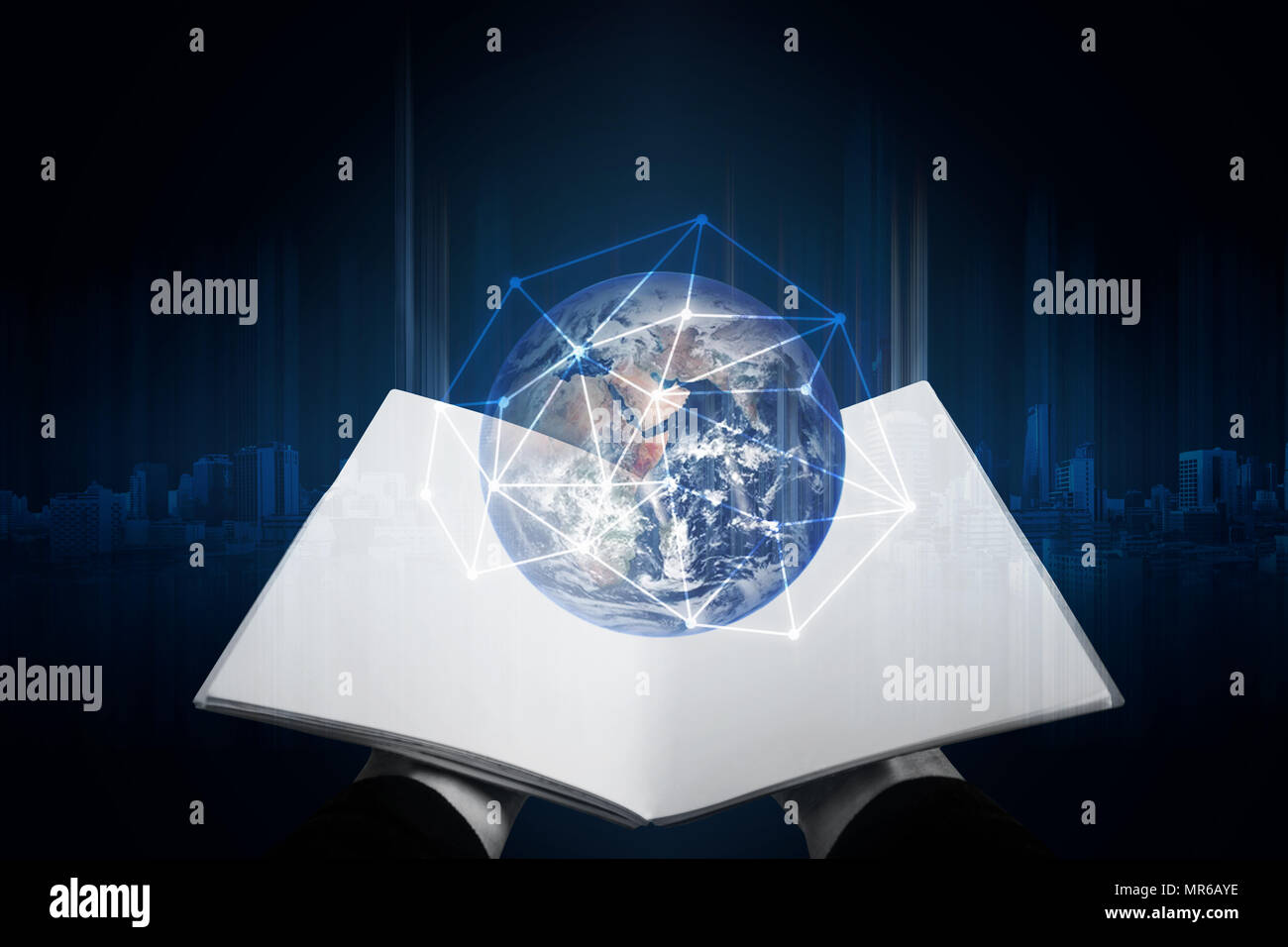 Hand opened book and global with network connection. Elements of this ...