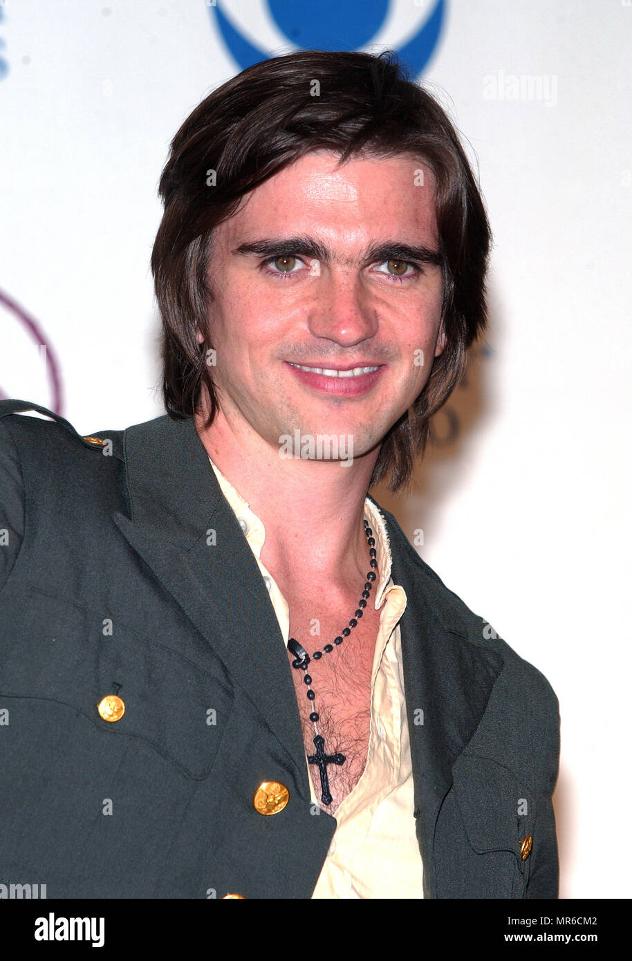 Juanes poses in the press room at the 3rd Annual Latin Grammy Awards at ...