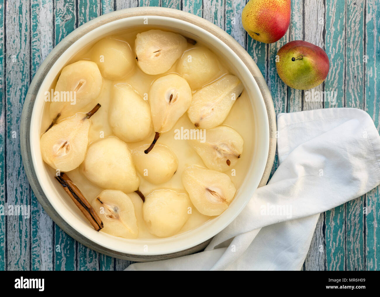 Halves poached pear hi-res stock photography and images - Alamy