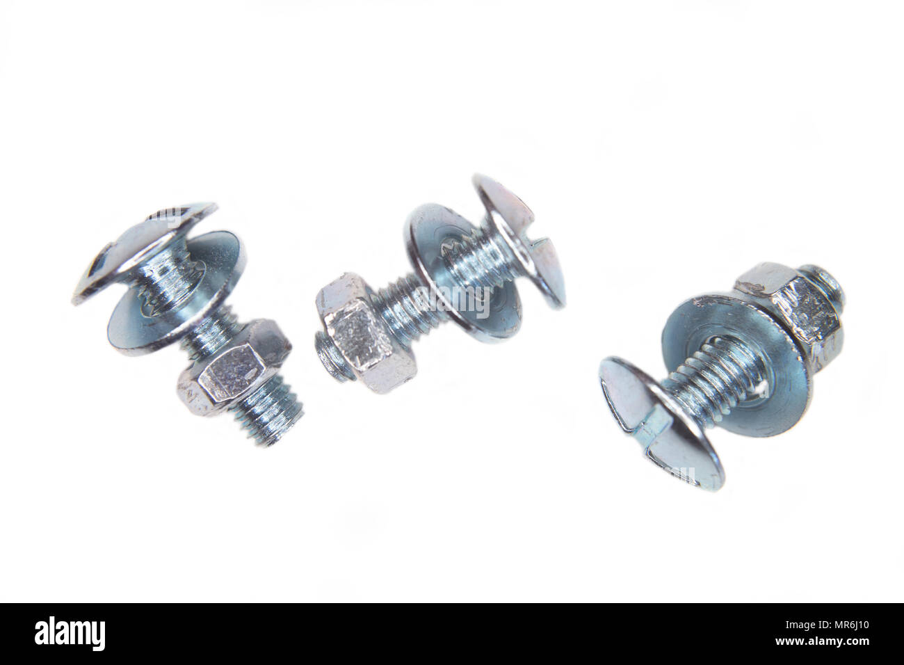 Metal nut and screw on a white background Stock Photo - Alamy