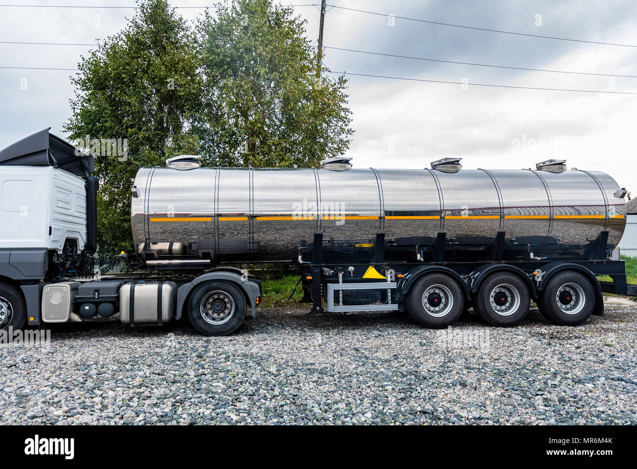 Fuel tanker truck parked Stock Photo - Alamy