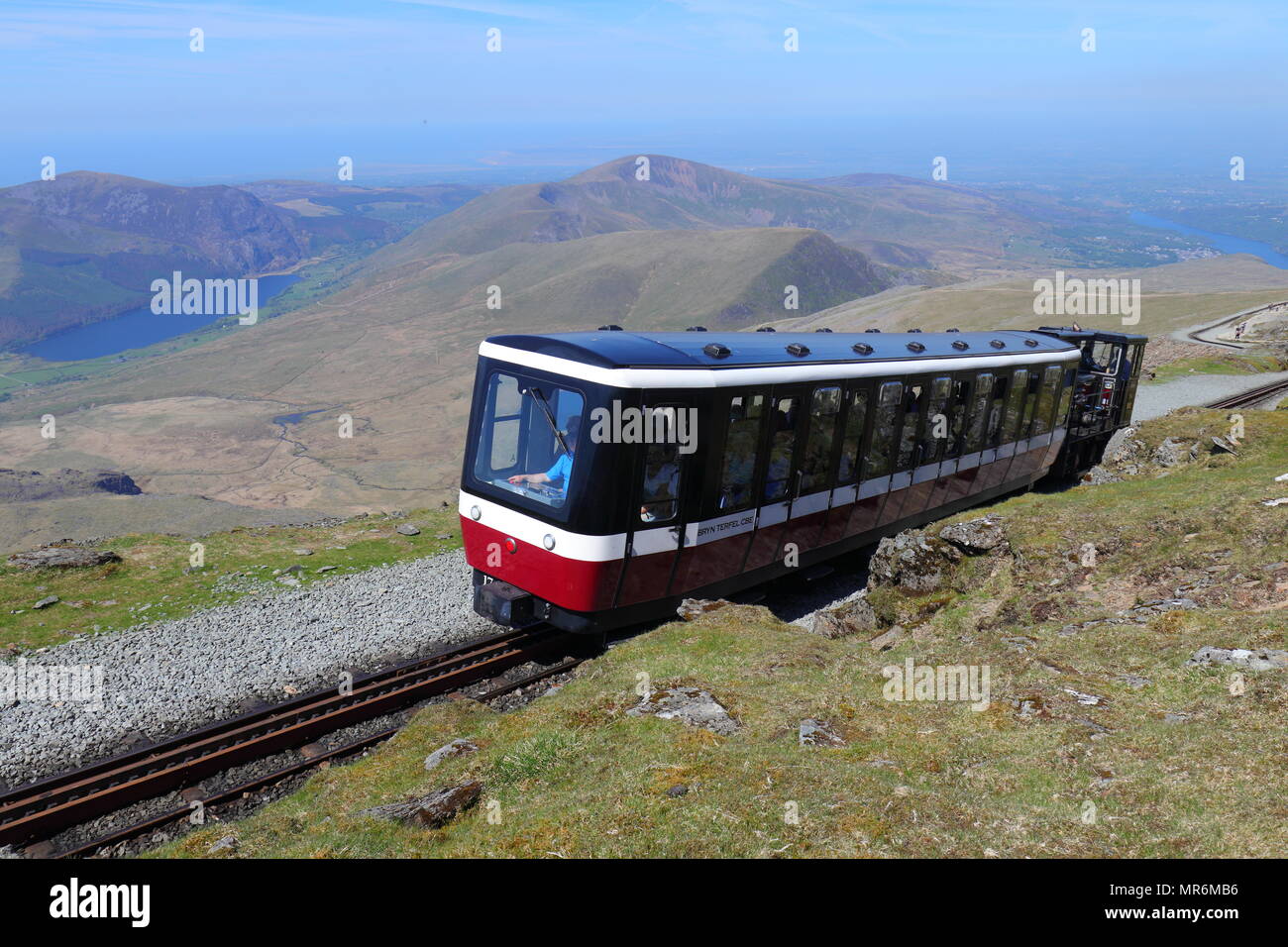 Welsh Mountain Railway train ascending to Snowdon Summit Stock Photo ...