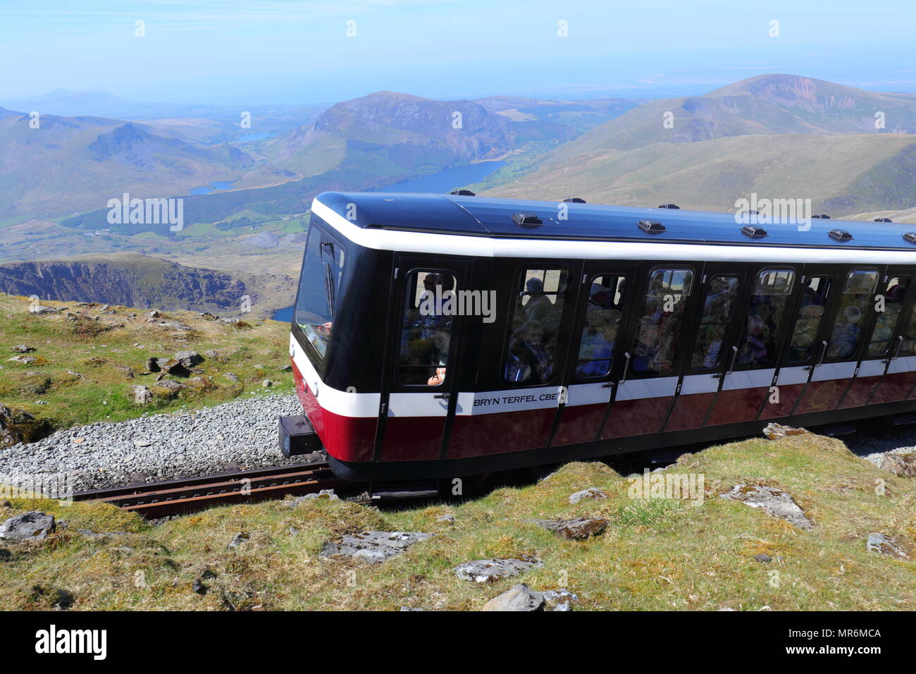 Welsh Mountain Railway train ascending to Snowdon Summit Stock Photo ...