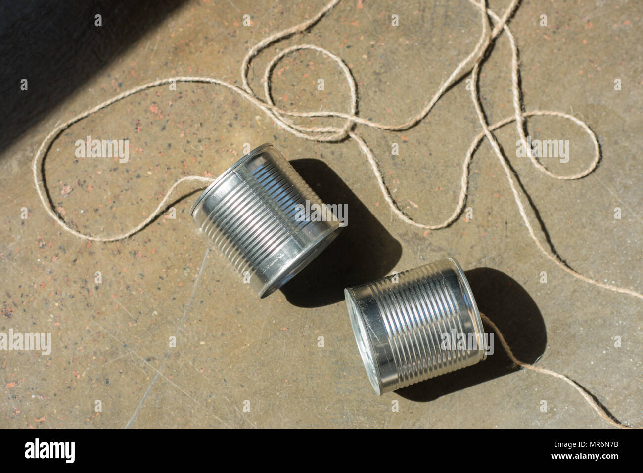 Rope And Cans High Resolution Stock Photography and Images - Alamy