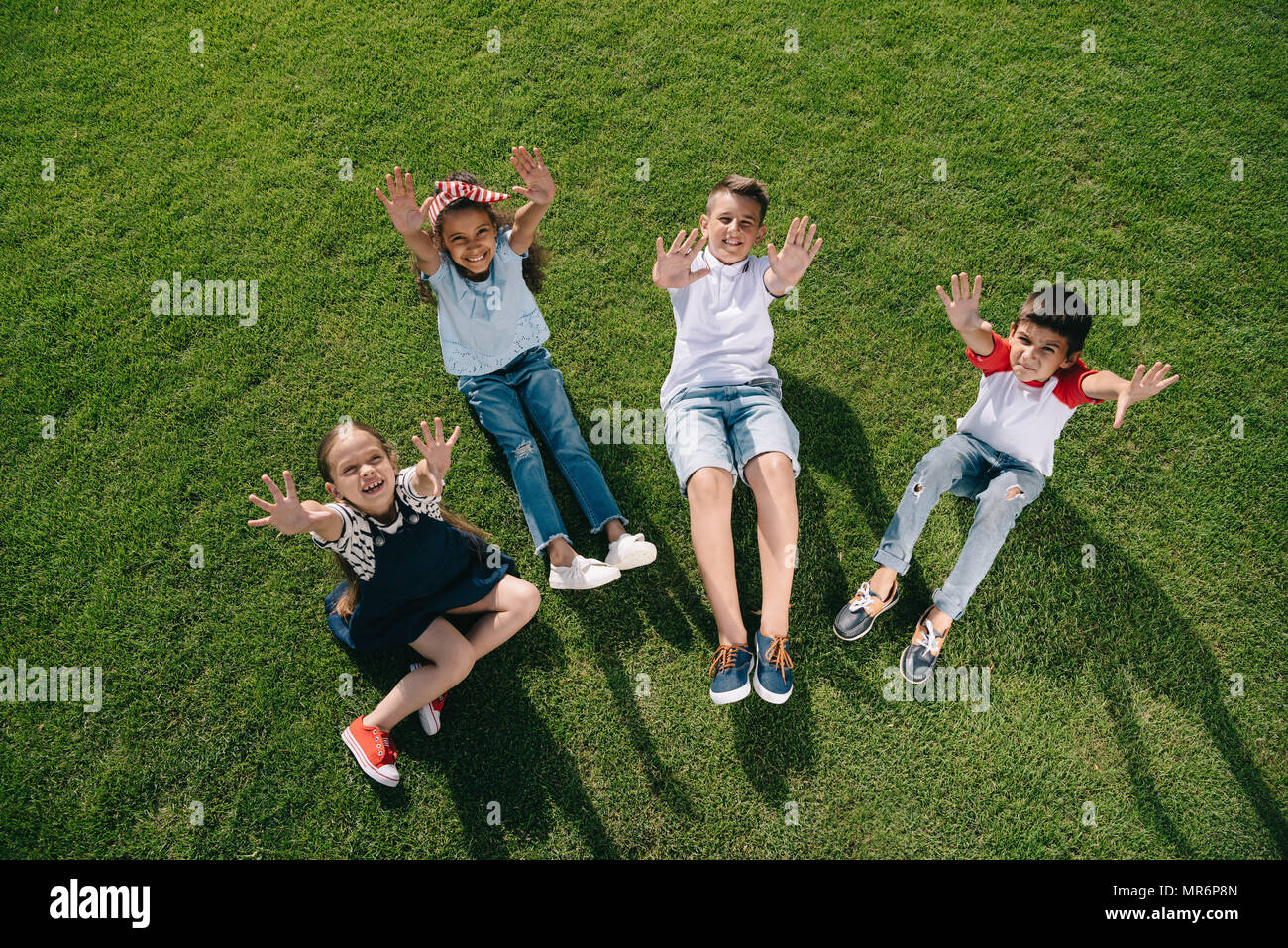 Kids wave to camera hi-res stock photography and images - Alamy