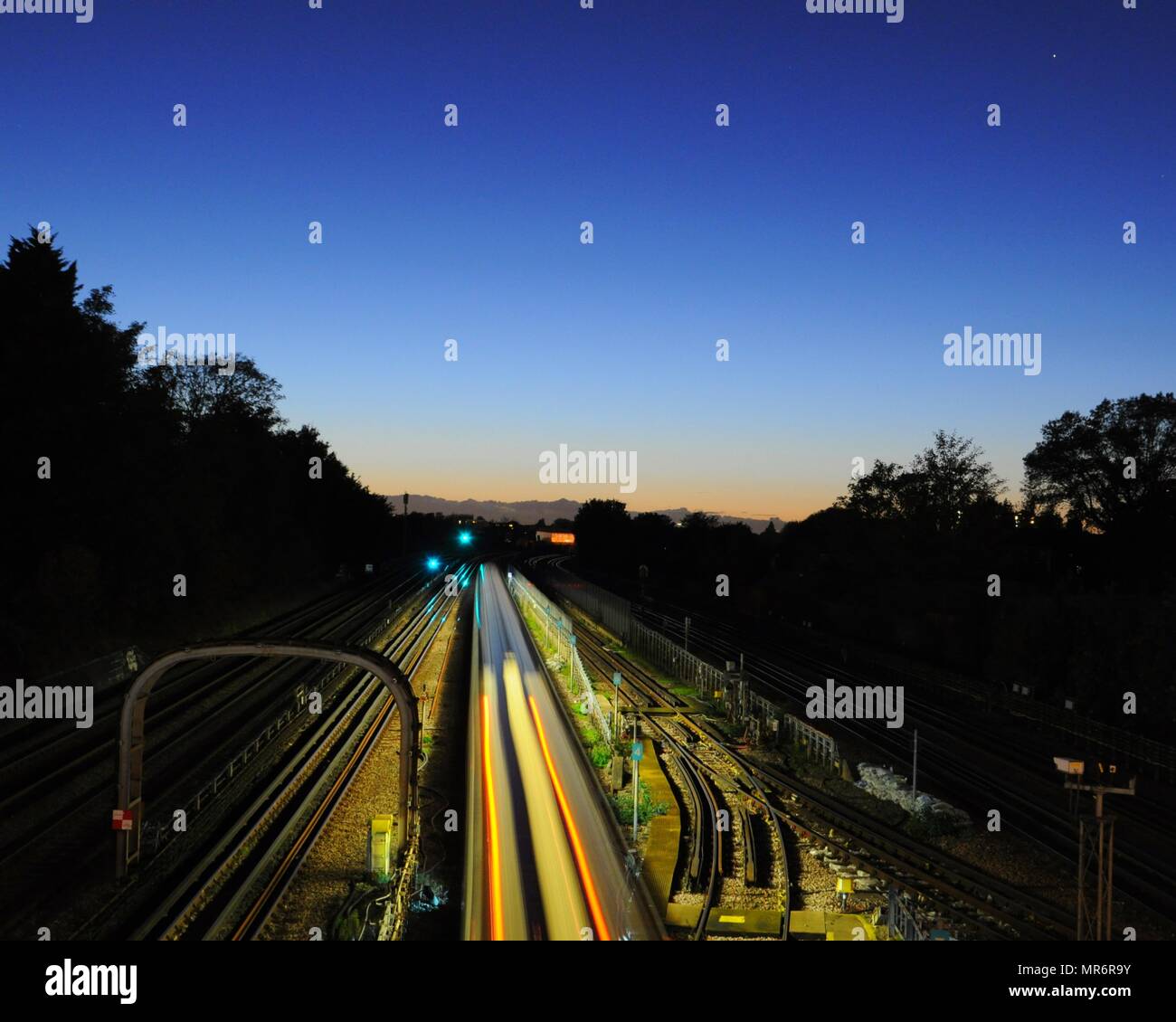 Trains passing through West Hampstead, London, photographed from West ...