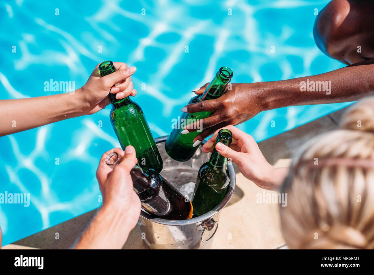 Hands bucket of ice water hi-res stock photography and images - Alamy