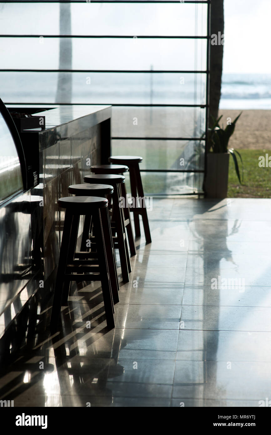 empty bar counter in hotel restaurant with seashore on background Stock ...