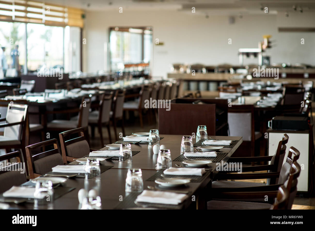 empty restaurant with served tables for catering Stock Photo - Alamy
