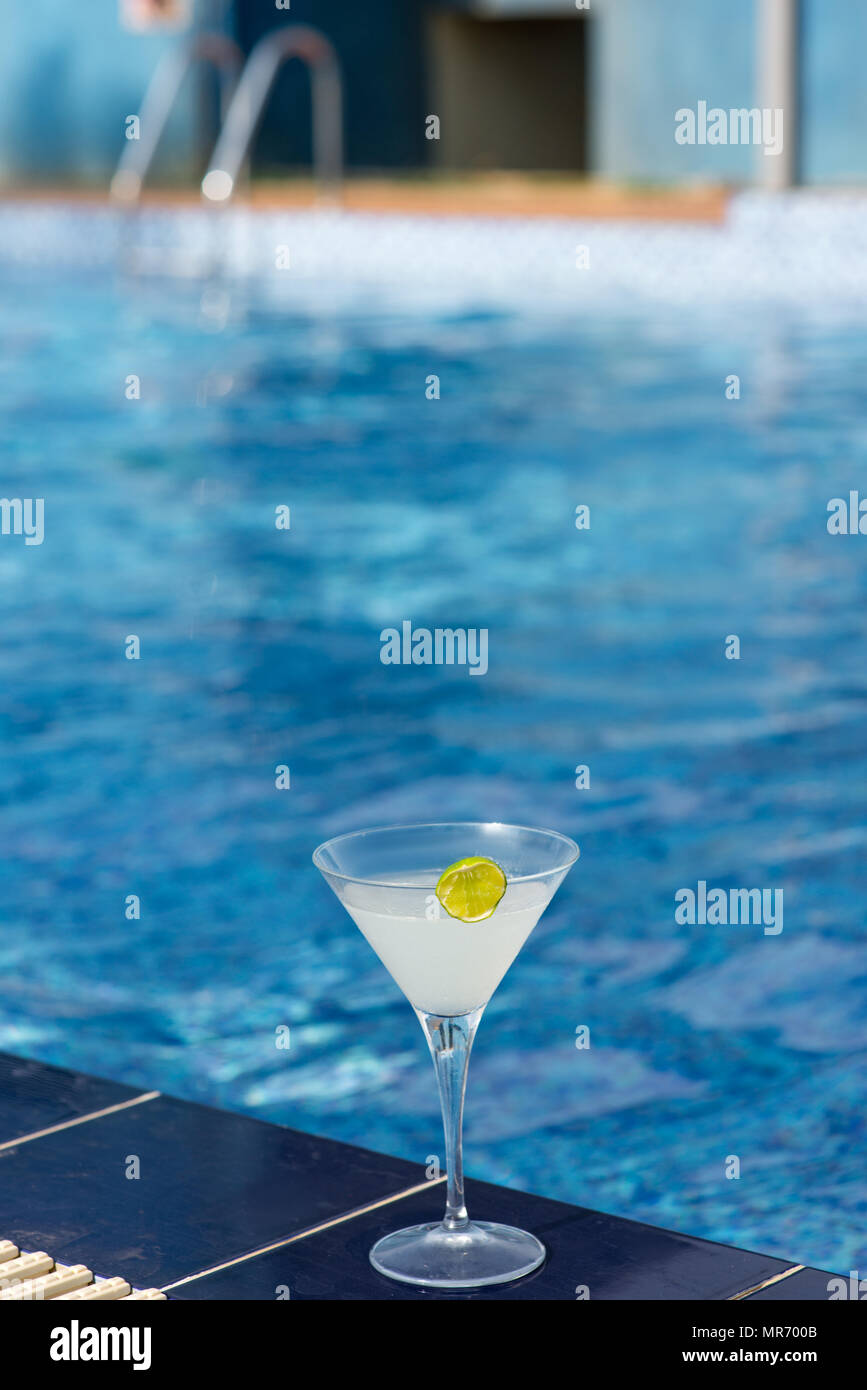 delicious margarita cocktail standing by swimming pool Stock Photo - Alamy