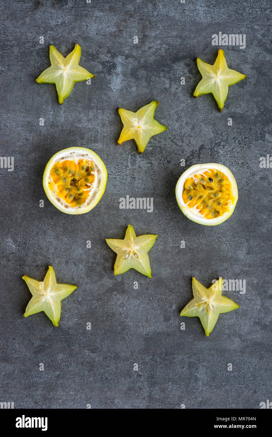 top view of tropical fruits composition on dark concrete surface Stock ...