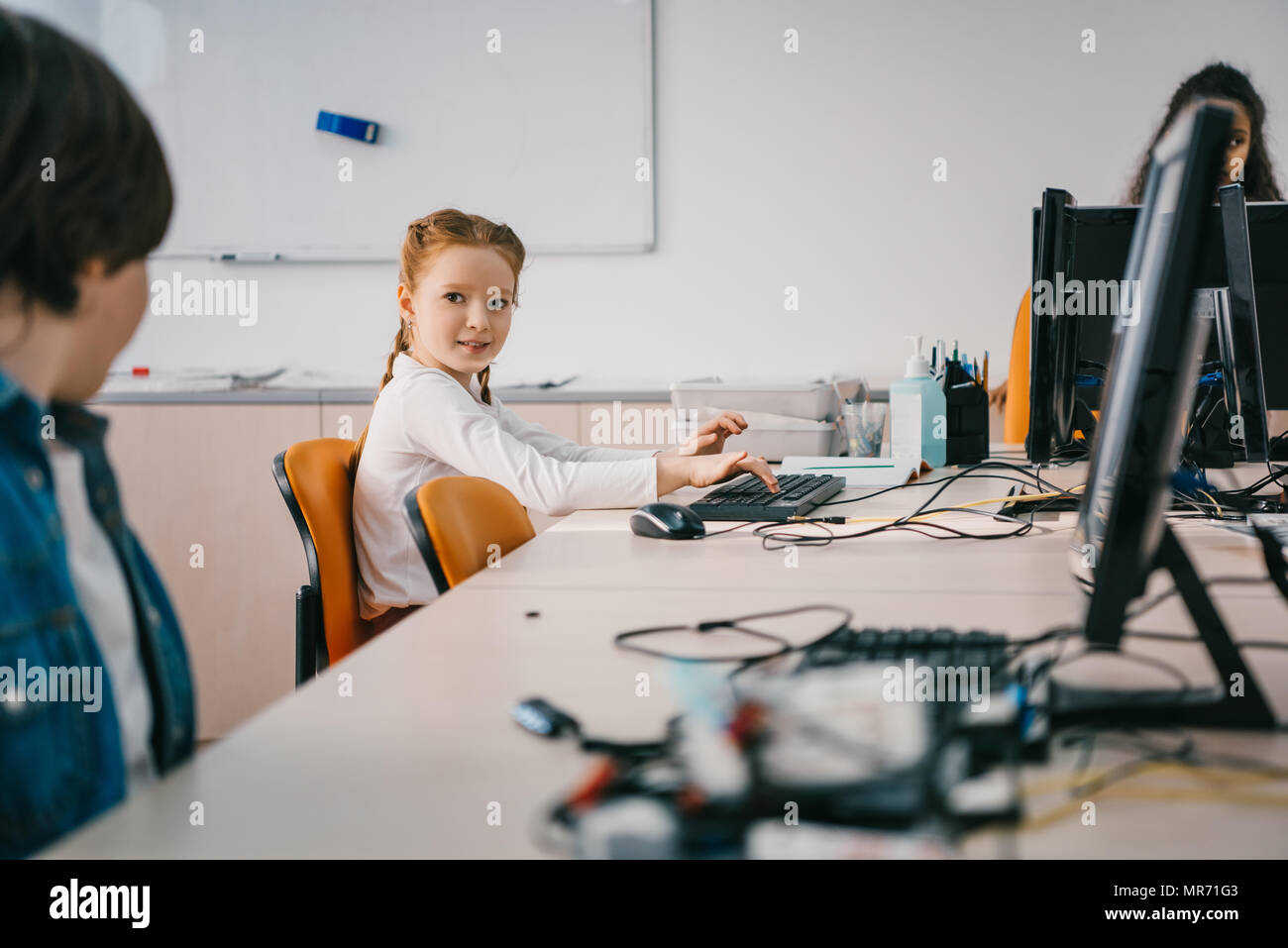 happy kids working together at machinery class, stem education concept ...