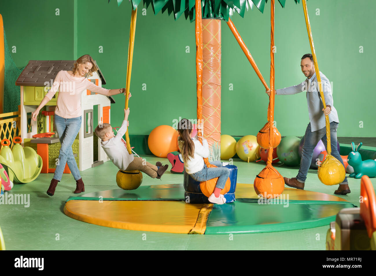Children swings indoors hi-res stock photography and images - Alamy