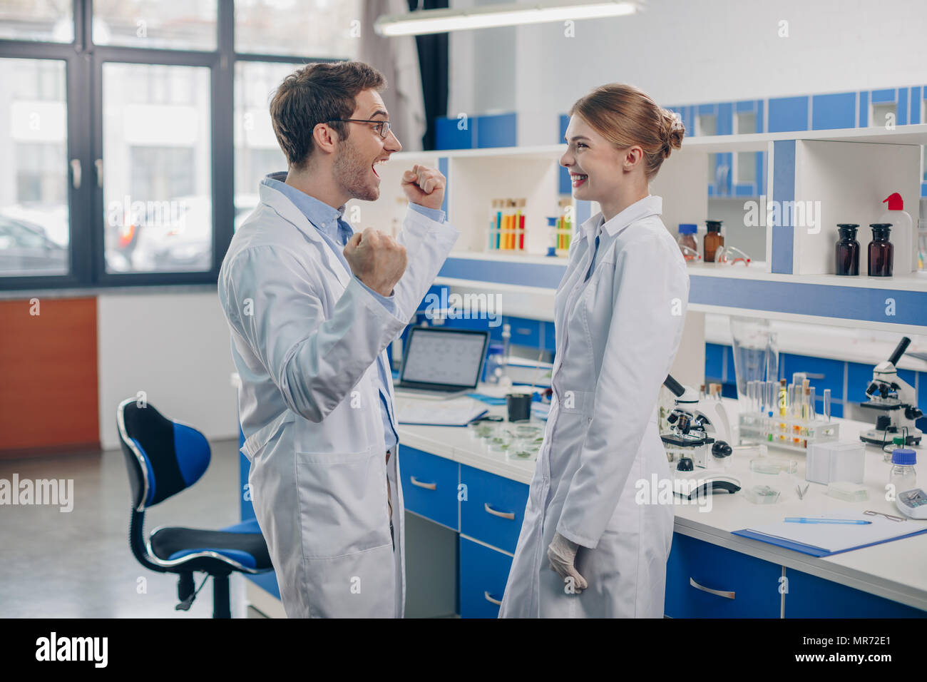 Excited scientists hi-res stock photography and images - Alamy