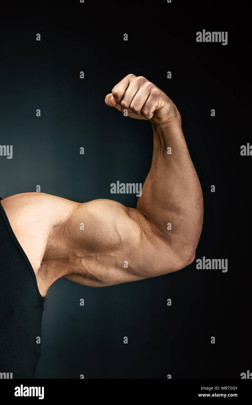 Man with muscles isolated hi-res stock photography and images - Alamy