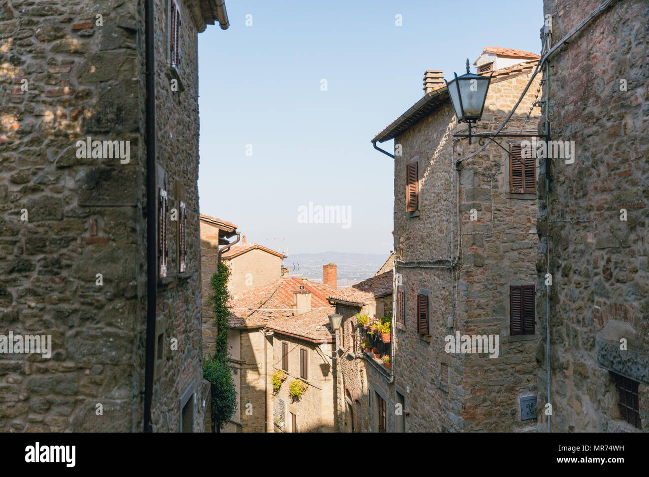 urban scene with historical architecture of Tuscany and clear blue sky ...
