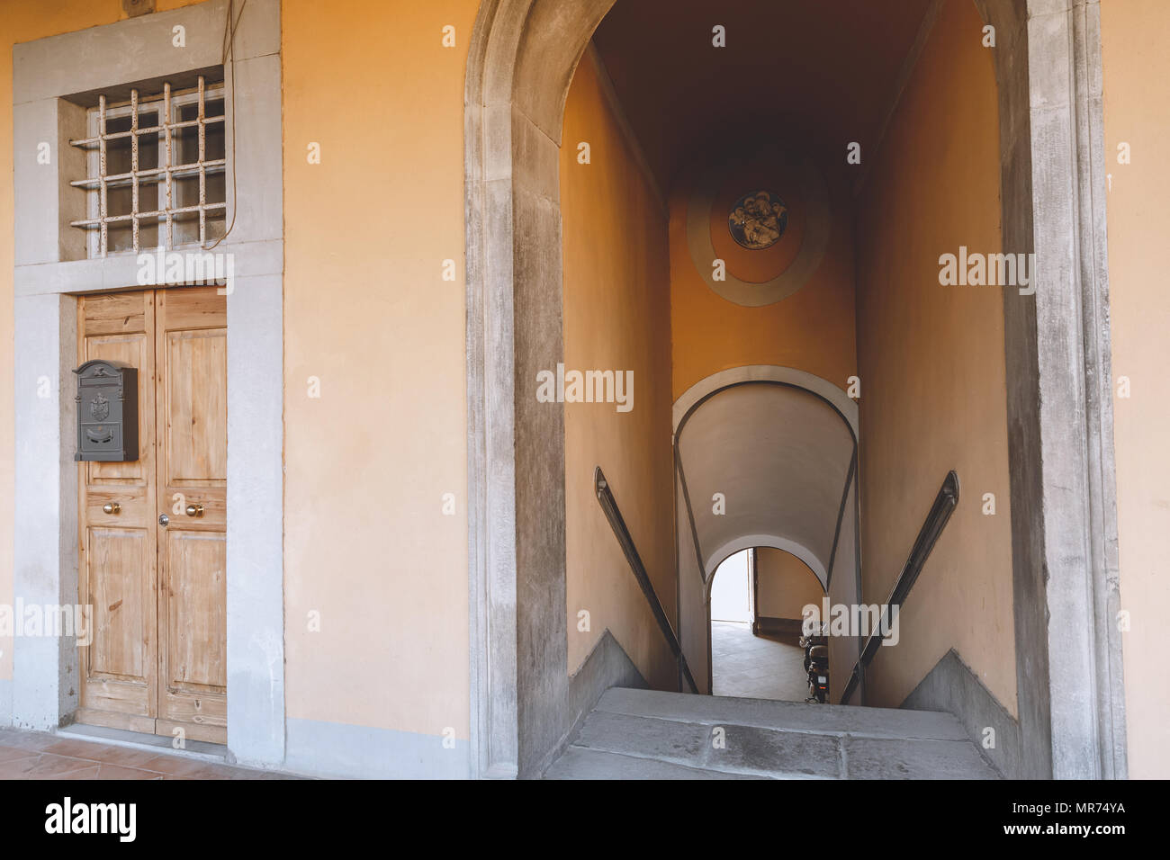 arch and staircase in old building, Pisa, Italy Stock Photo - Alamy