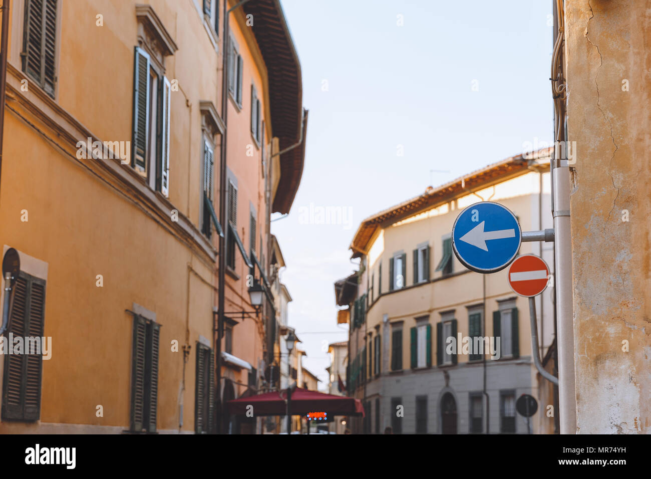 old buildings and road signs on street in Pisa, Italy Stock Photo - Alamy