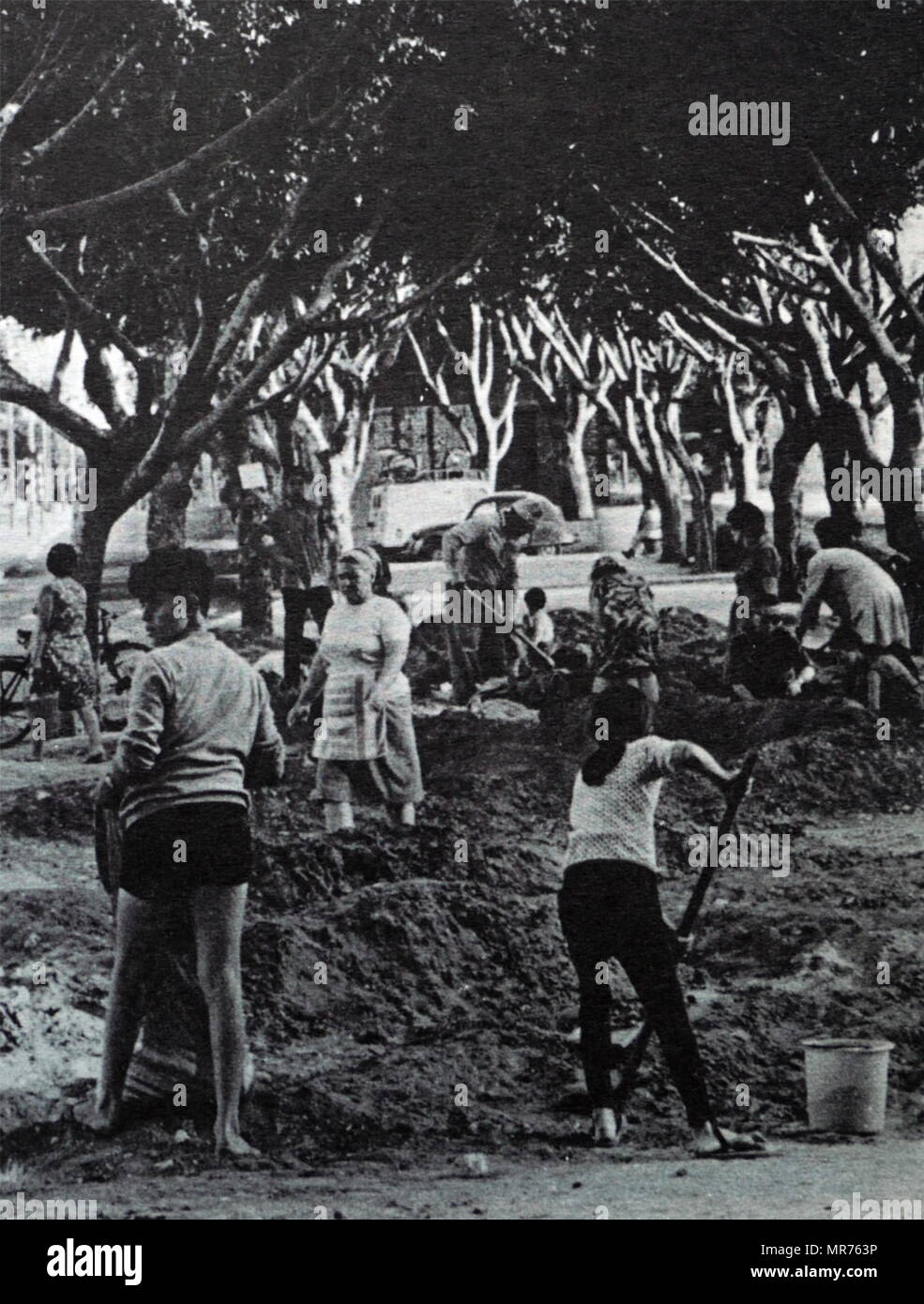 Israeli civilians in Tel Aviv, Israel fill sandbags just before the ...