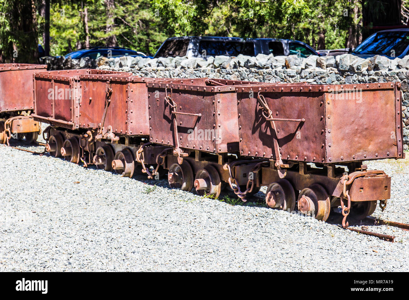 Row Of Rusty Oxidized Ore Carts Once Used In Mining Operations Stock ...