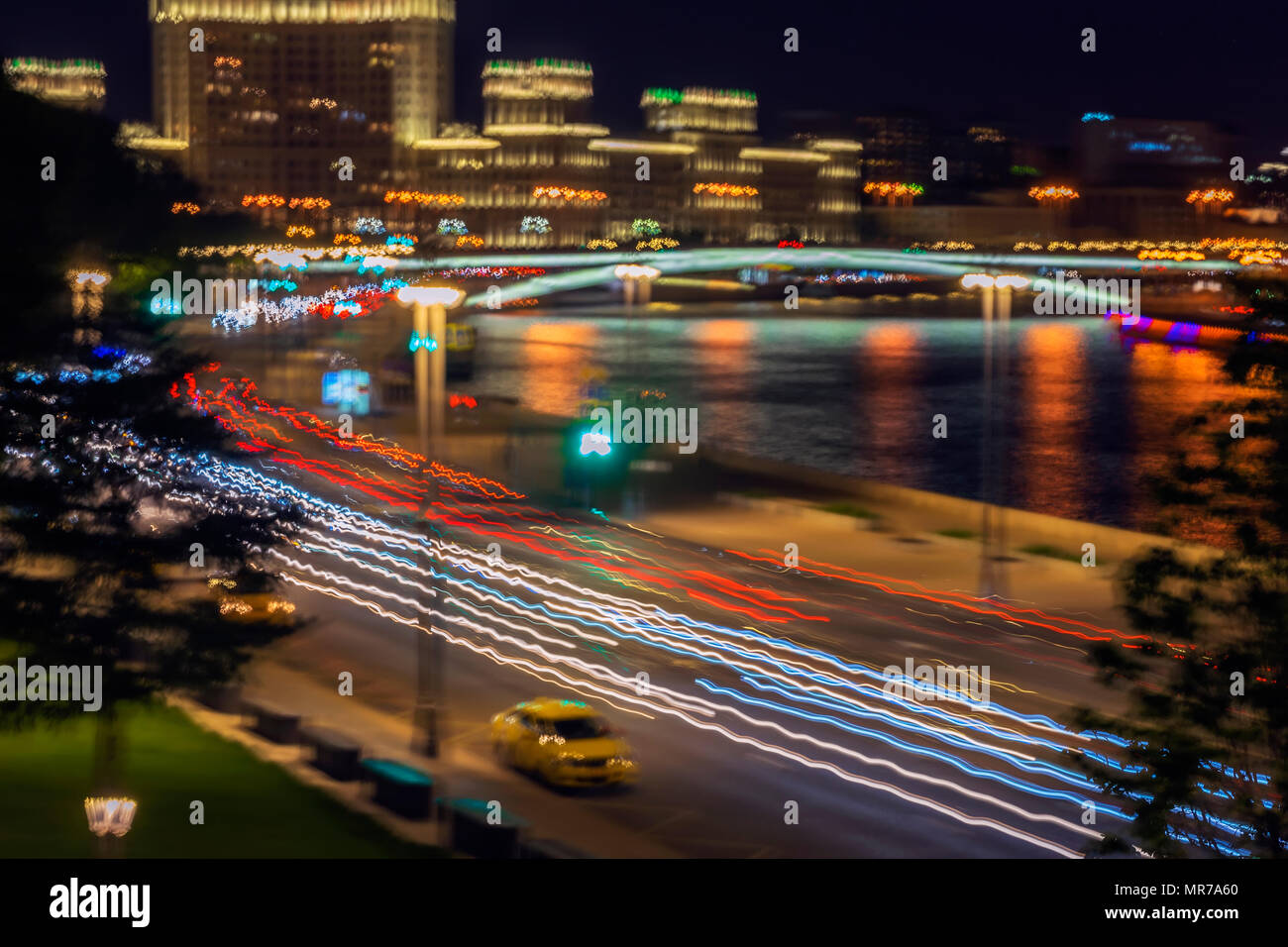 Abstract bright blurred colorful background of urban street night ...