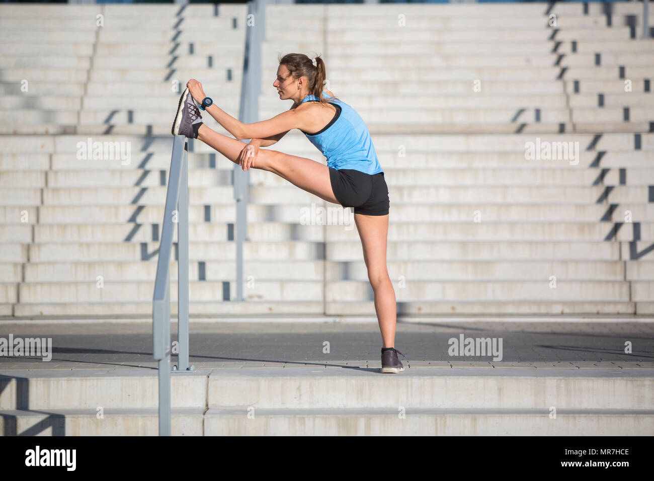 Woman Athlete preparing to run Stock Photo - Alamy