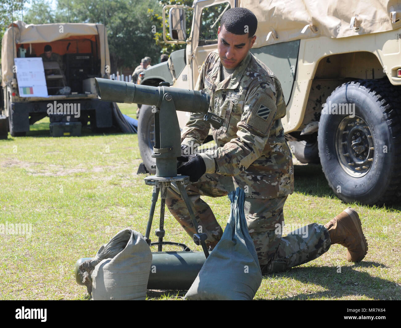 Spc. Reinaldo G. Cermeno, a cannon crewmember from Charlie Battery, 1st ...
