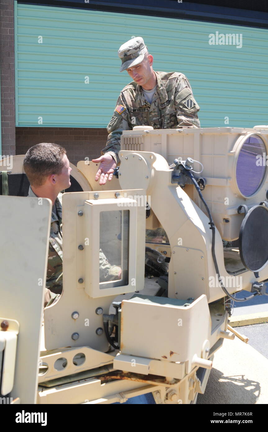 Sgt. Eric J. Mayville, a fire support specialist from Headquarters and ...