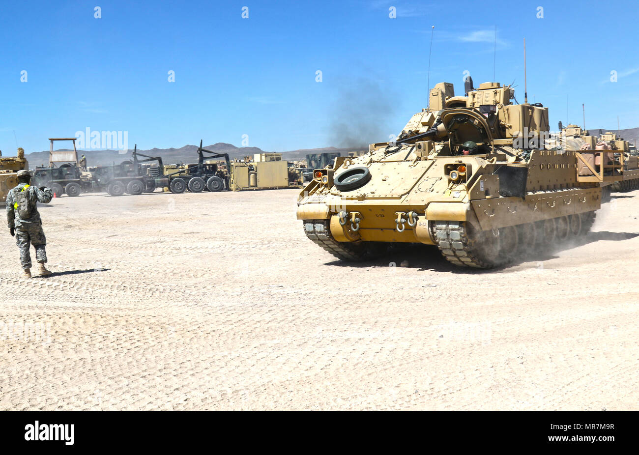 Soldiers with the 1st Battalion, 155th Infantry Regiment, move in line ...