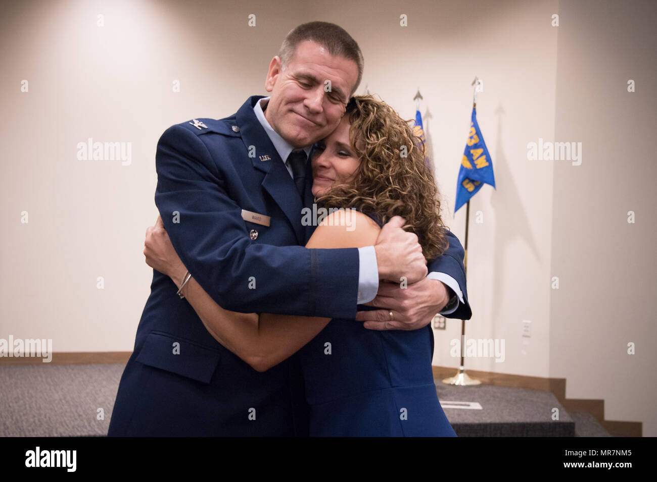 Retired Col. Howard Ward Jr. hugs Kathy May, wife of Col. Brian May ...