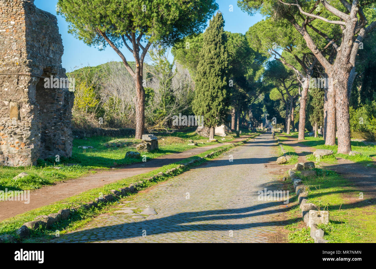 The ancient Appian Way (Appia Antica) on a sunny spring morning, in ...
