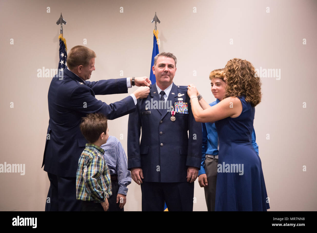 Retired Col. Howard Ward Jr. pins colonel rank on the lapels of Col ...
