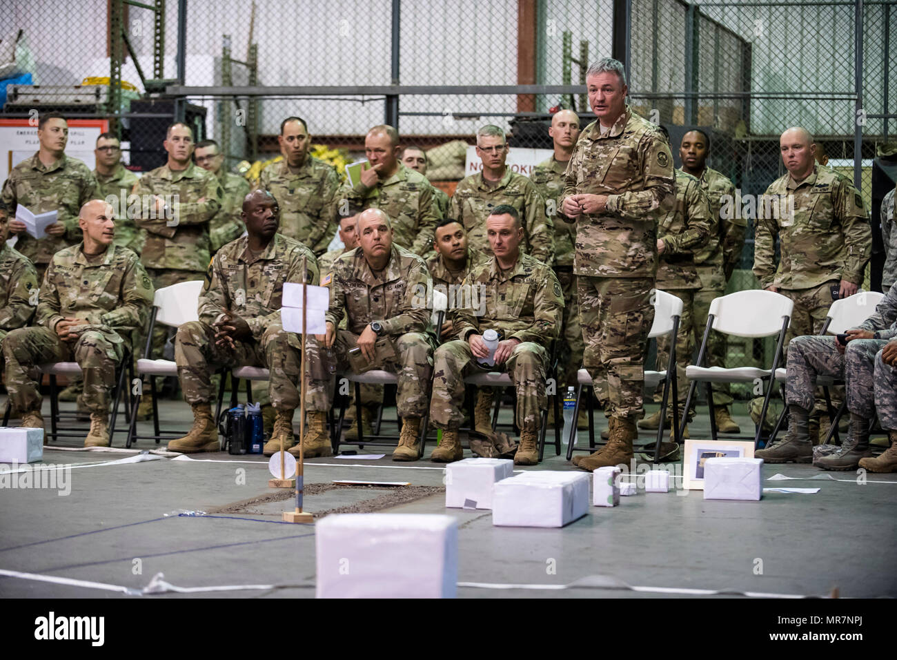 U.S. Army Col. Brian Hughes, Joint Task Force – Bravo, speaks during a ...