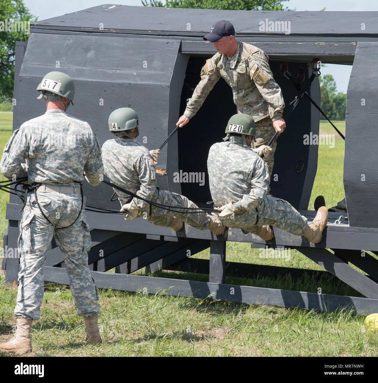 National Guardsmen from all over the nation practice rappelling from a ...