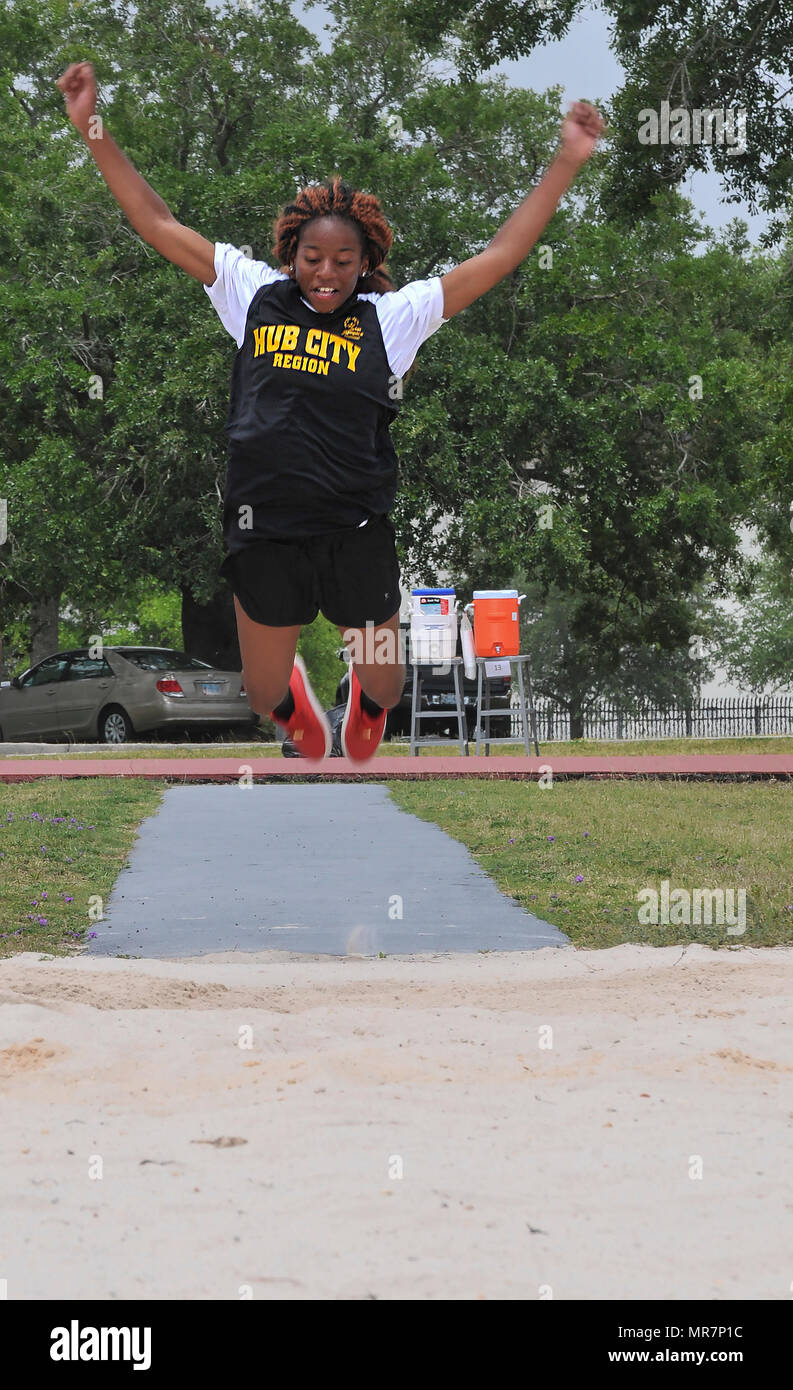 Calandra Taylor, Area 1, competes in the running long jump during the ...