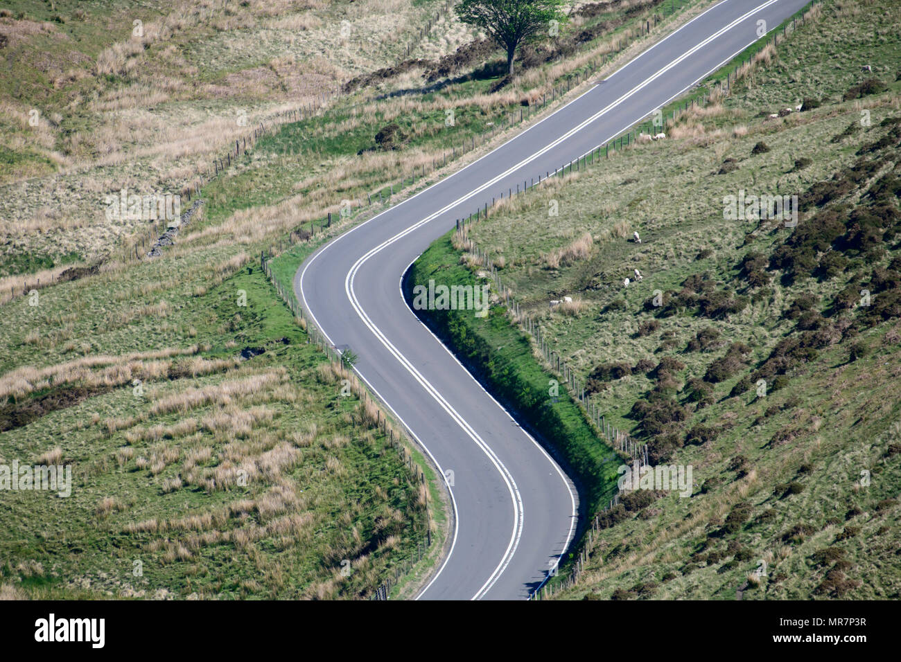 Winding road through hills in hi-res stock photography and images - Alamy