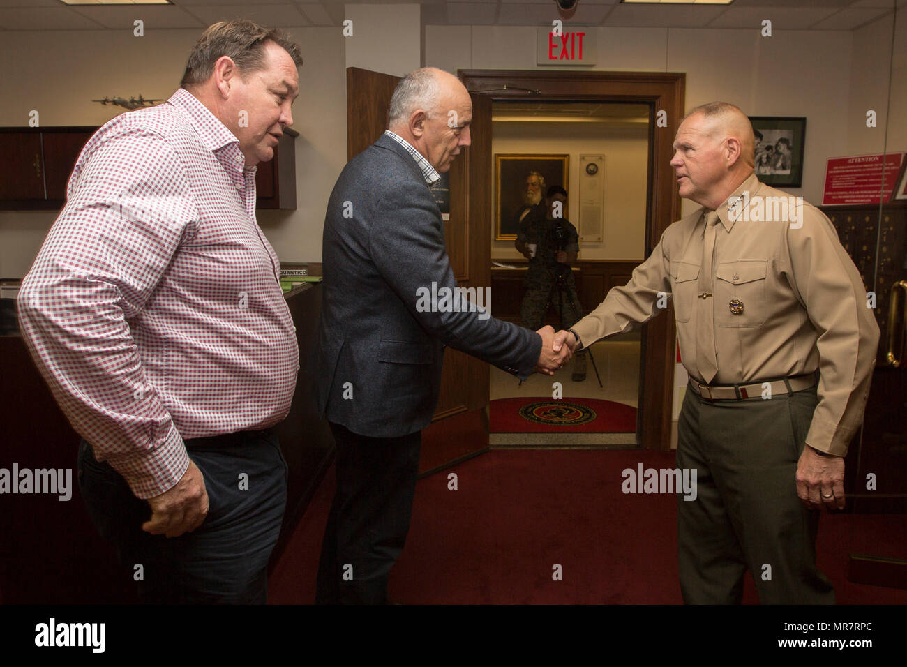 Commandant of the Marine Corps Gen. Robert B. Neller, right, shakes ...
