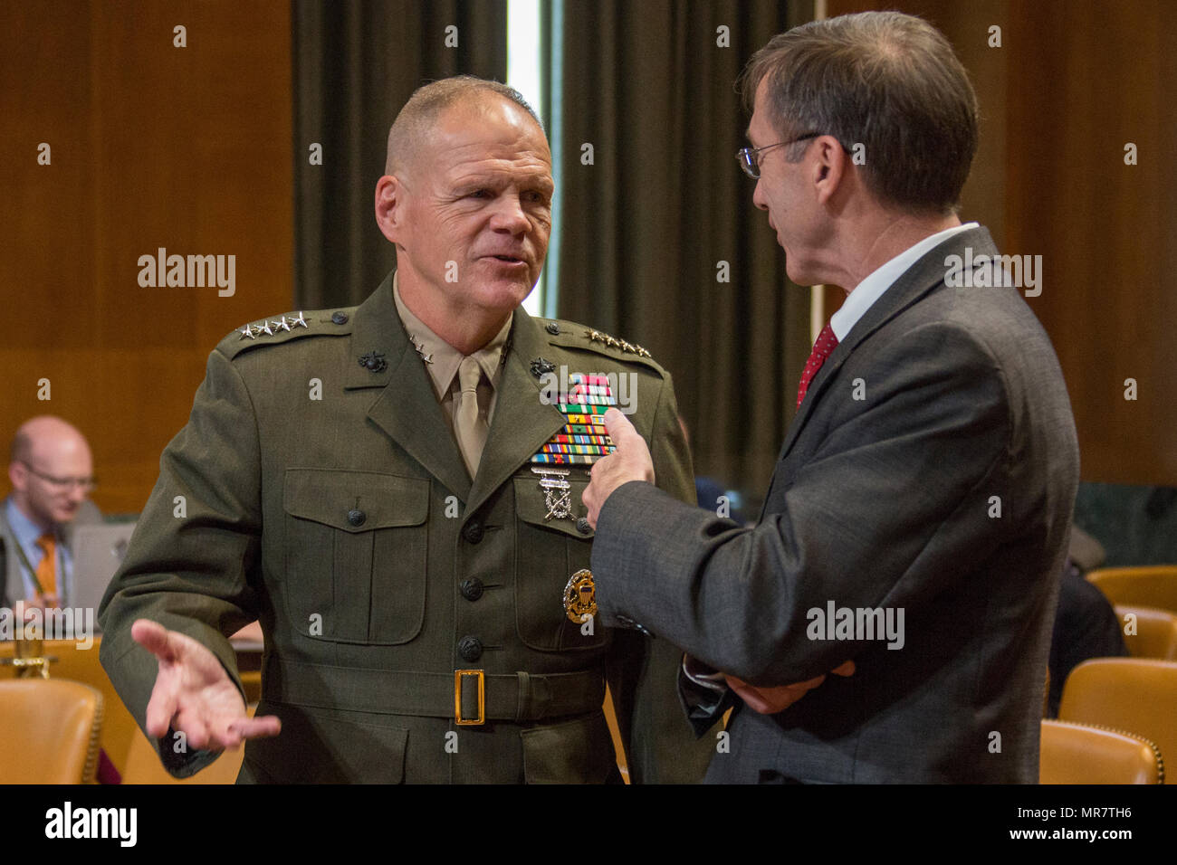 Commandant of the Marine Corps Gen. Robert B. Neller, left, speaks with ...