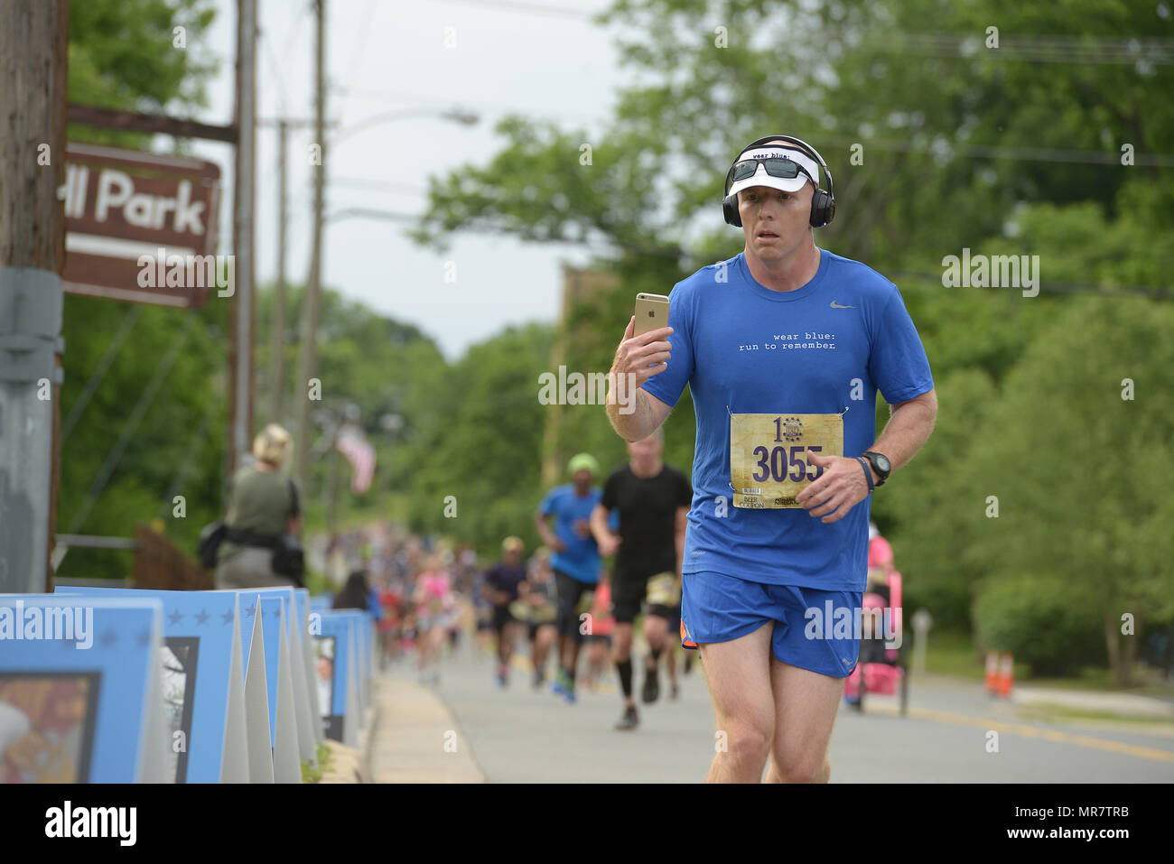 37 year-old runner James Gorynski of Hubert, North Carolina, records ...