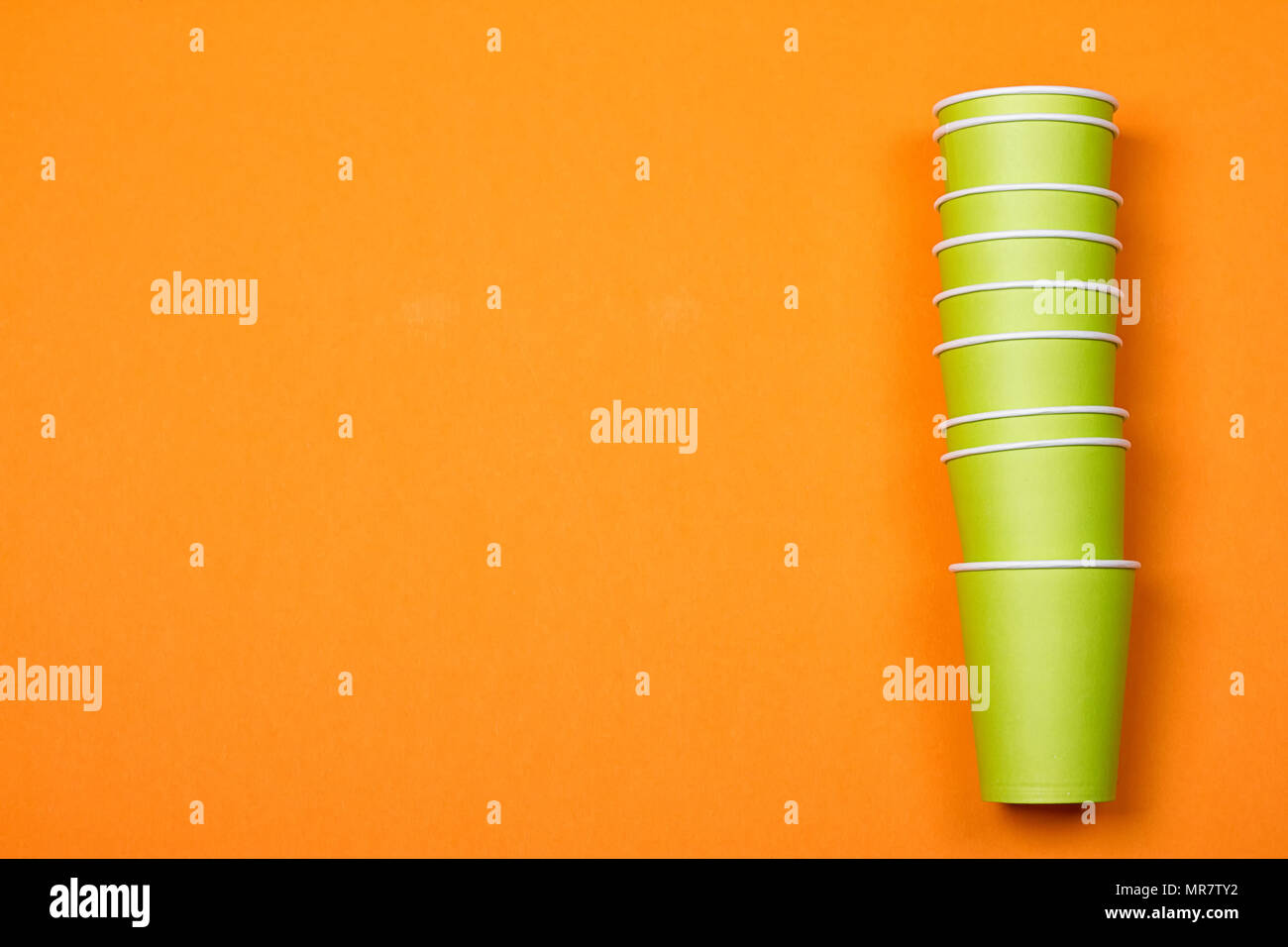 recycling colorful paper glass on the orange background Stock Photo - Alamy